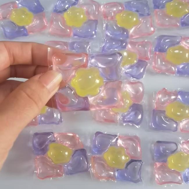 Close-up view of multi-colored laundry detergent pods
