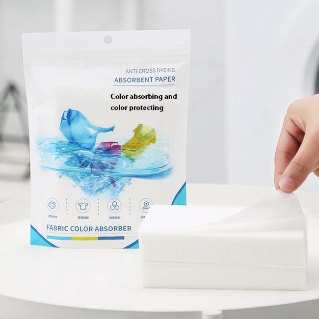 Color absorbing laundry sheets in use