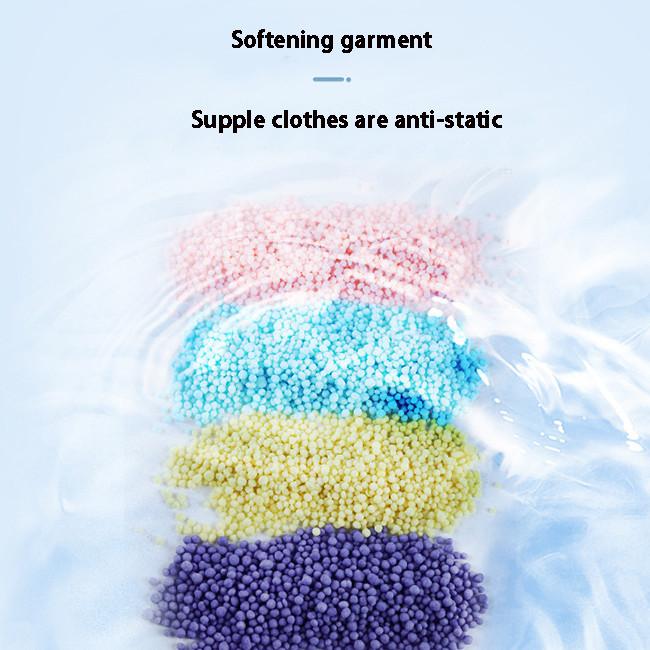 Laundry beads being poured into washing machine