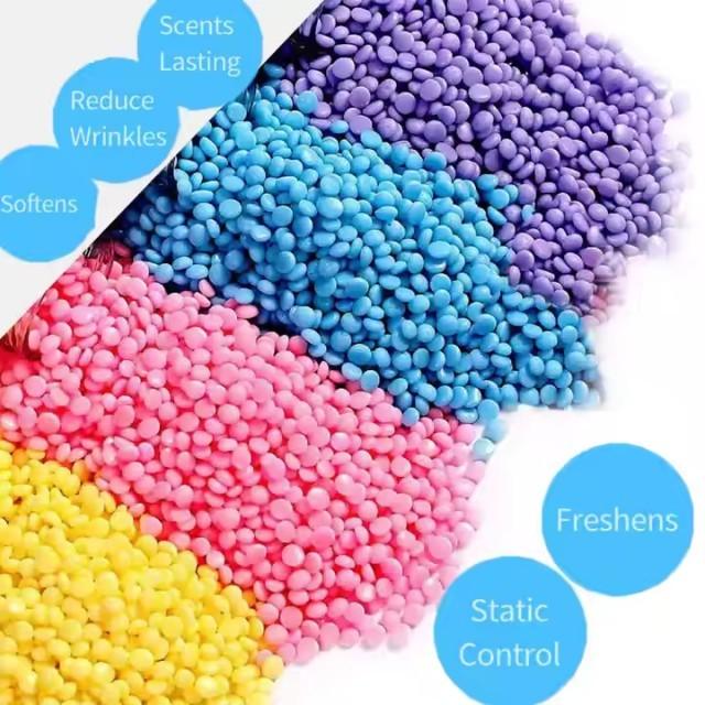 Laundry scent booster beads in various colors