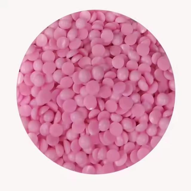 Laundry scent booster beads in use with washing machine