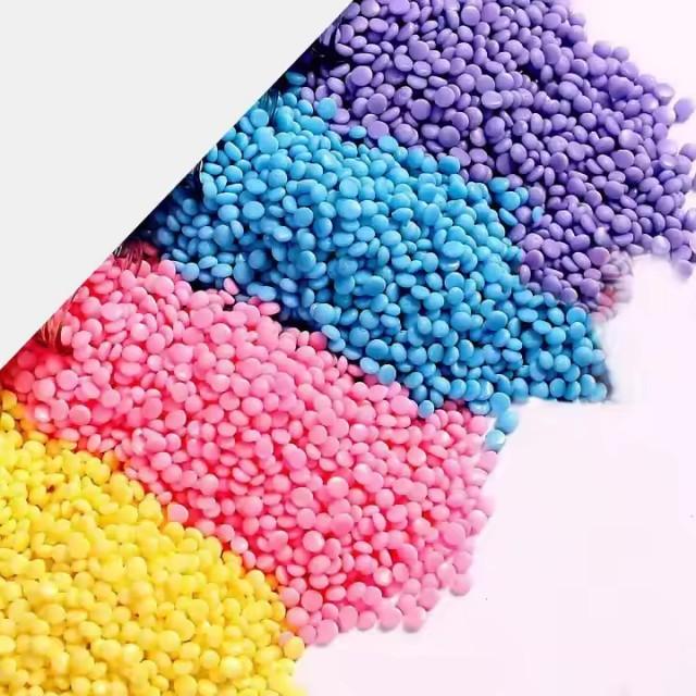 Laundry scent booster beads in various colors