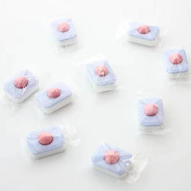 Close-up view of dishwasher tablets showing solid form