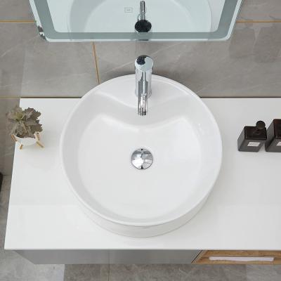 China Impact Resistant Above Counter White Porcelain Wash Basin For Bathroom for sale