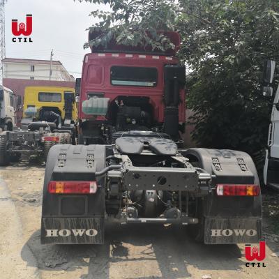 中国 HOWO-SHACMANの赤い6x4-4x2頑丈な使用された340-420hpトラクターのヘッド トラック 販売のため