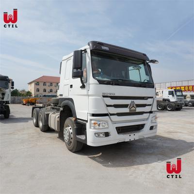 Cina Nuovo camion capo resistente rosso del rimorchio di trattore 6x4 di SINOTRUK HOWO in vendita