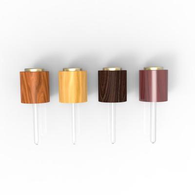 Cina Cappuccio di plastica 18 mm 20 mm 24 mm di legno di bambù Press Button Dropper per la bottiglia di olio essenziale in vendita