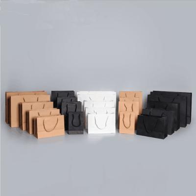Cina Sacchetti della spesa bianchi di carta kraft di Brown con l'abitudine dell'OEM delle maniglie stampati in vendita