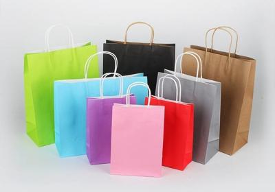 Cina Logo Paper Kraft Shopping Bag su ordinazione che imprime con la maniglia in vendita