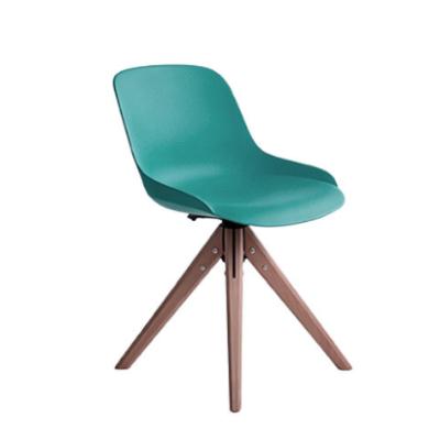 China Swivel Modern Restaurant Chairs PP Shell Tapered Beech Wood Legs For Cafe Hotel for sale