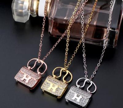 China Rose gold/silver/gold plated delicate handbag pendant heart necklace for girls for sale