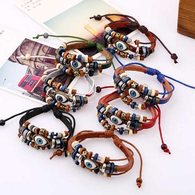 China Personalized handmade brown leather bracelet eye/cross  charms adjustable bracelet for men for sale