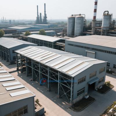 China Steel Prefab Godown Heavy Warehouse Purlin Column Peb Building for sale