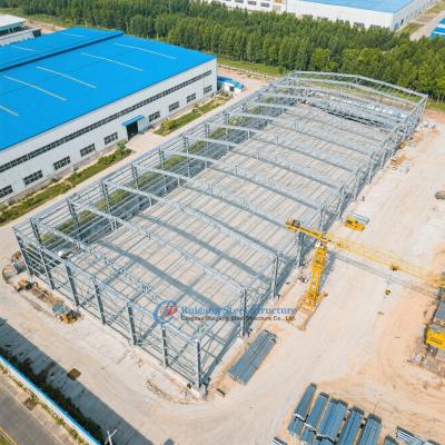 China Large Span Customized PEB Steel Structure Warehouse For Industrial Use With Crane And Ventilator for sale