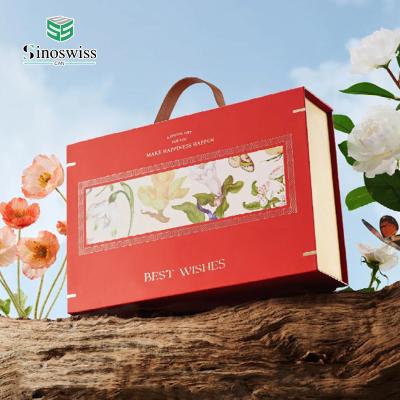 China Luxury Gift Paper Boxes Packaging With Leather Ribbon Handle Foldable Box for sale
