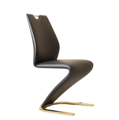 China Modern Luxury Art Design Z Shape Synthetic Leather Makeup Salon Chair High Back Dining Chairs Metal Legs Ergonomic Accent Chair for sale