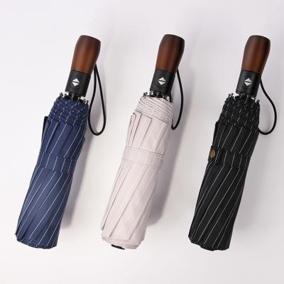 China 23 Inches 3-Fold Auto Open And Close Umbrella With Wooden Handle for sale