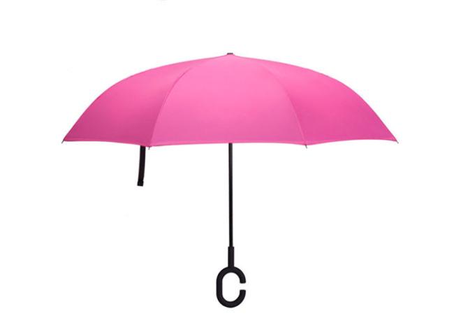 Side view of the umbrella showing full length and metal shaft