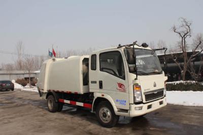 中国 炭素鋼の油圧油圧コンパクターのごみ収集車 Sinotruk Howo 5 への 16 CBM 販売のため