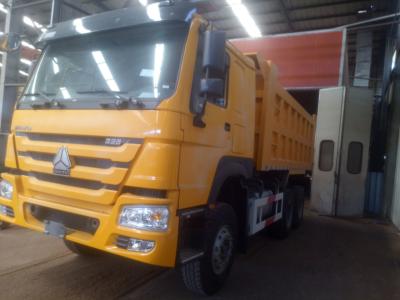 Cina Ente commerciale di sollevamento ventrale del secchio di tonnellate 5400 * 2300 * 1500mm dell'autocarro con cassone ribaltabile di Sinotruk Howo 40 in vendita