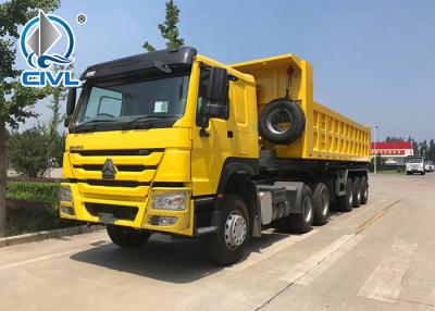 中国 後部半ダンプのSinotruk 3の車軸60Tトレーラーのダンプカー 販売のため