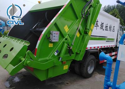 中国 20のMpaの油圧装置が付いている4x2廃物のコンパクターのトラックをリサイクルするSINOTRUKのコンパクターのごみ収集車 販売のため