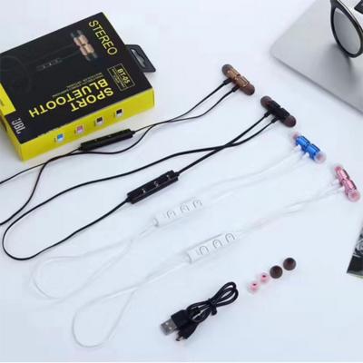 China OEM Bulk Cell Phone Earpiece Intelligent Music Pause Sport Dual Wireless Headphones for sale