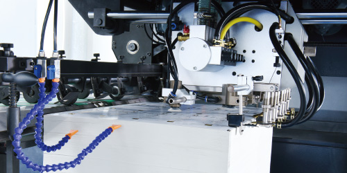 Precision feeder system for automatic die cutting machine