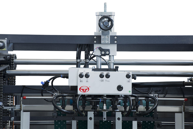 Detailed view of high-speed film lamination machine components