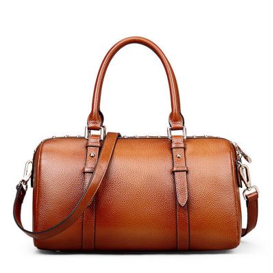 China Genuine Leather Boston Bags for Women Brown Pillow Vintage Bags with Rivet Interior Slot Pocket for sale