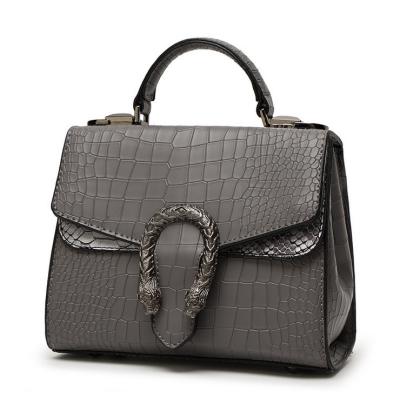 China PU Leather Handbags Designer Bags for Women Serpentine Pattern Tote Bags for sale