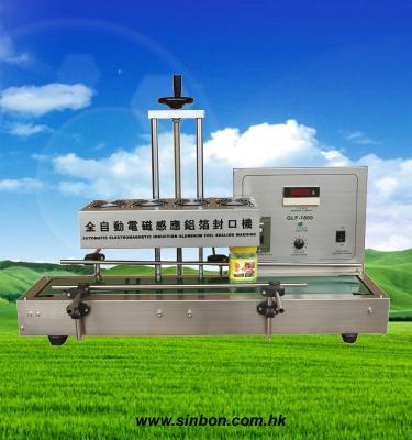 China Auto Continous Induction Cap Sealing Machine aluminium foil sealing machine for bottles for sale