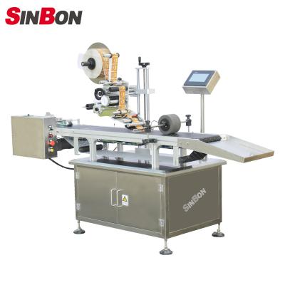 China Automatic page separating labeling machine for pouch labeling machine for pouch for sale