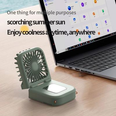 China 2000mAh Battery Handheld Fan Foldable USB Fan Humidify Function Mini Portable Fan for sale