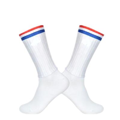China Hautfreundliche und maßgeschneiderte rutschfeste Fußballsocken für Sportteams zu verkaufen