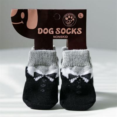 Cina 4PCS Calzature calde per cuccioli di cane Calzature per animali da compagnia morbide e traspiranti Magliette per cani piccoli Stile di squadra alta in vendita