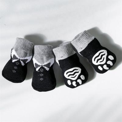 Cina 4PCS Calzature calde per cuccioli di cane Calzature per animali da compagnia morbide e traspiranti Magliette per cani piccoli Stile di squadra alta in vendita