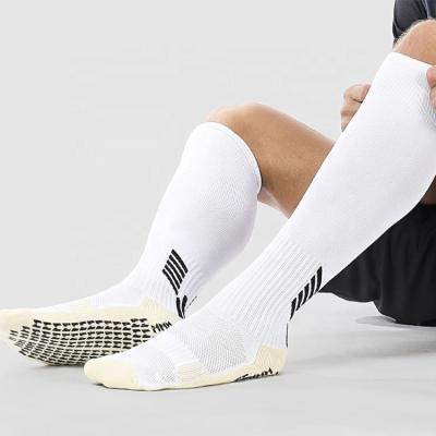 China Custom Kid Anti Slip Sock Football Sport Performance Grip Socks Logo positie Manschet Te koop