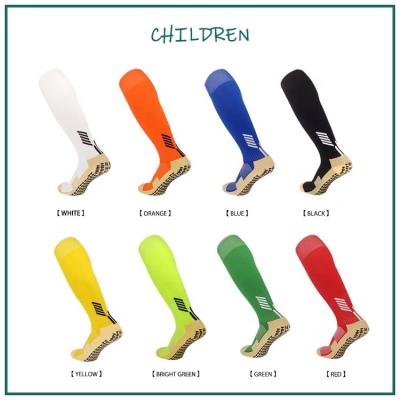 China Custom Kid Anti Slip Sock Football Sport Performance Grip Socks Logo positie Manschet Te koop