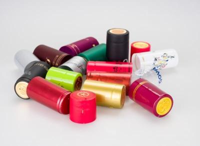 China Custom Round Wine Bottle Foil Capsules PVC Wine Shrink Caps Pilfer Proof for sale