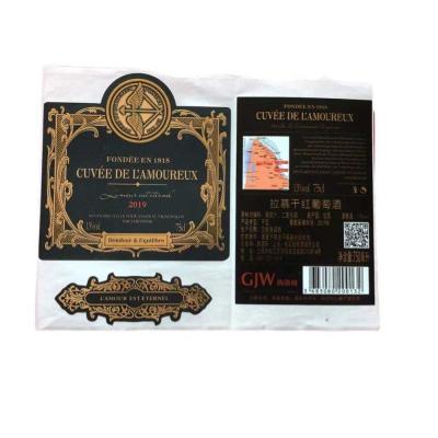 China Carimbo de ouro de papel impermeável gravado da etiqueta de Kraft do teste padrão da garrafa de vidro do vinho da água à venda