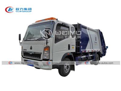 China HOWO Cummins Engine Carbon Steel Sanitation Compactor Garbage Truck 4mm 8cbm for sale