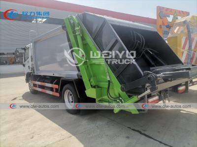 China Dongfeng Hydraulic Type Compressed Garbage Truck Mini Capacity 3000liters Gallons for sale