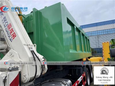 China SINOTRUK HOWO 8x4 LHD Hydraulic Hooklift Garbage Truck With Folded Arm Crane for sale
