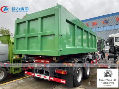 China SINOTRUK HOWO 8x4 LHD Hydraulic Hooklift Garbage Truck With Folded Arm Crane for sale