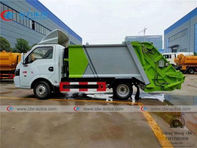 Cina Camion del compattatore di rifiuti del caricatore della parte posteriore di Dongfeng Tuyi 4x2 5000L 3T 4T in vendita