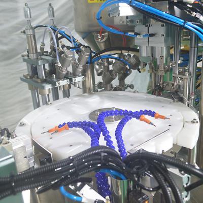 China 2 Chapas de parafuso Seringa Máquina integrada de preenchimento e tampa com alta precisão à venda