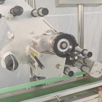 China Motor Core Components Automatic Plastic Bag Labeling Machine for Box/Bottle Packaging for sale