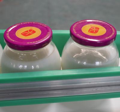 Cina Macchina di sigillamento a vuoto di bottiglie di vetro per varie forme e specifiche Ideale in vendita