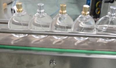 China Máquina elétrica de enchimento de garrafas de perfumes, tampa e rotulagem para produção automática à venda